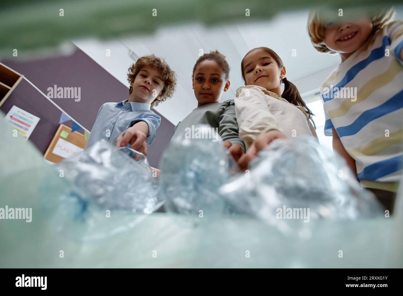 Recycling bin children hi-res stock photography and images - Alamy