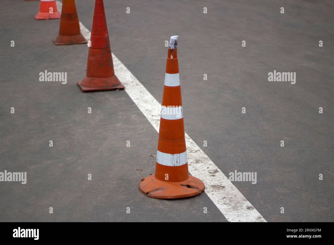 Road fence. Markings on the road. Fencing of repair work on the highway ...