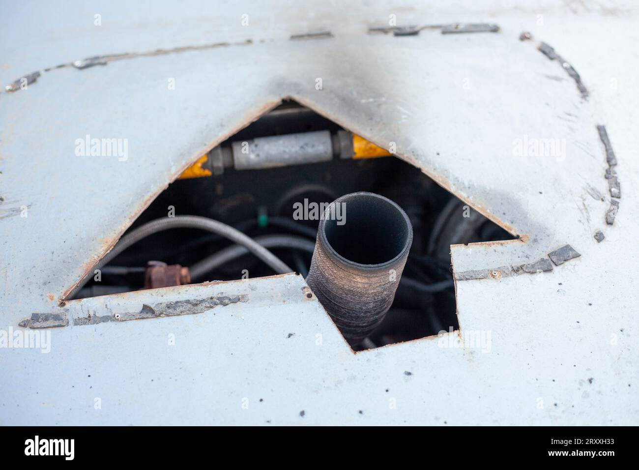Homemade exhaust pipe in the car. Pipe in the soot of the machine ...