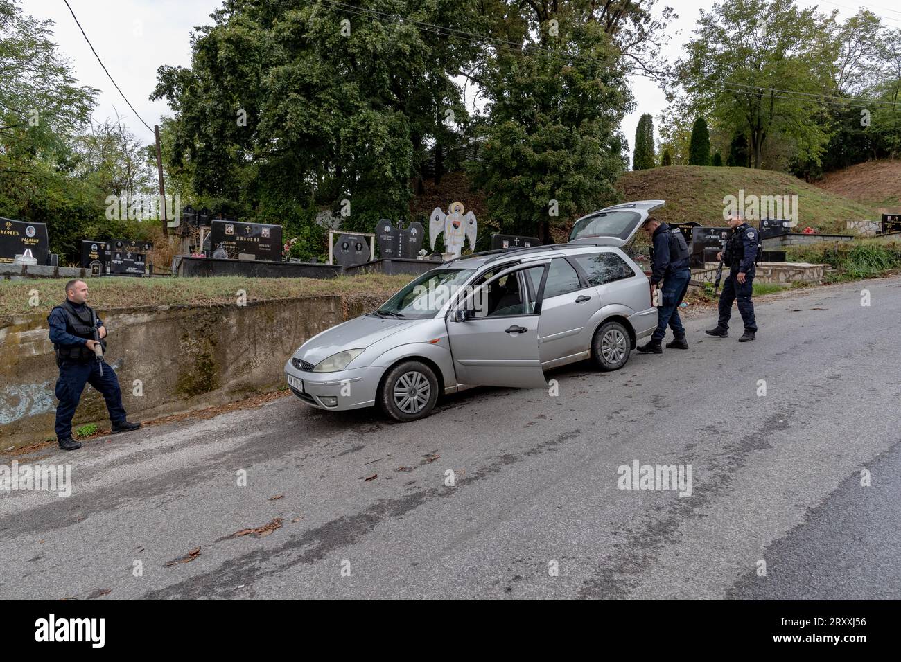 Kosovo's Fast Reaction Police Unit conducts a security check on a ...