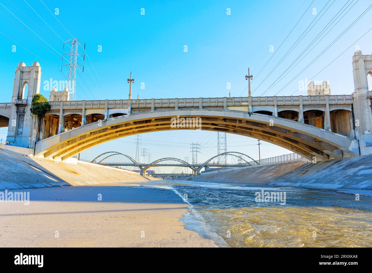 Urban landscape featuring the LA River, its connecting bridges and the ...