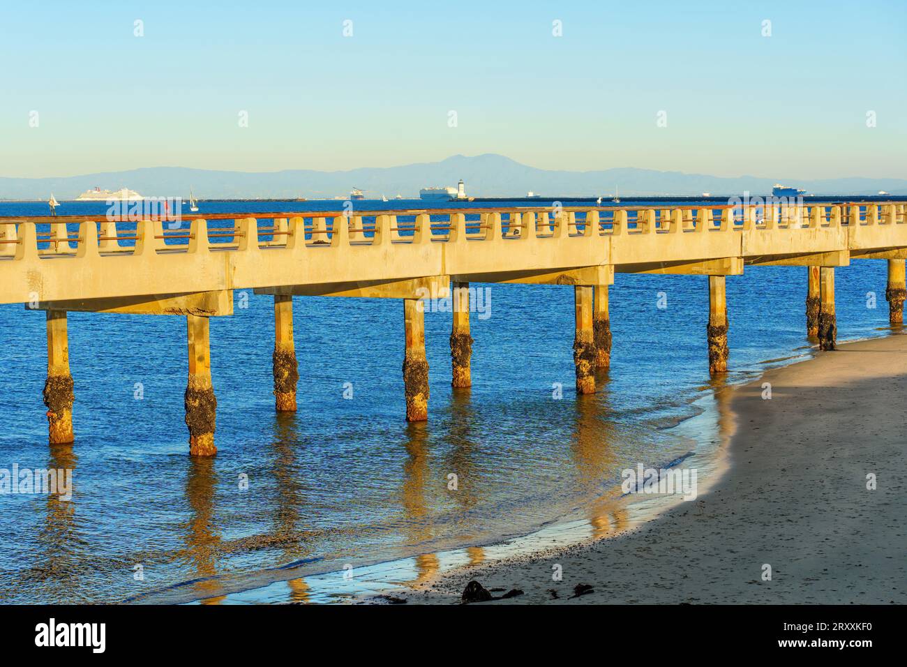 Sunlit concrete structure of the Cabrillo Beach Pier in San Pedro ...