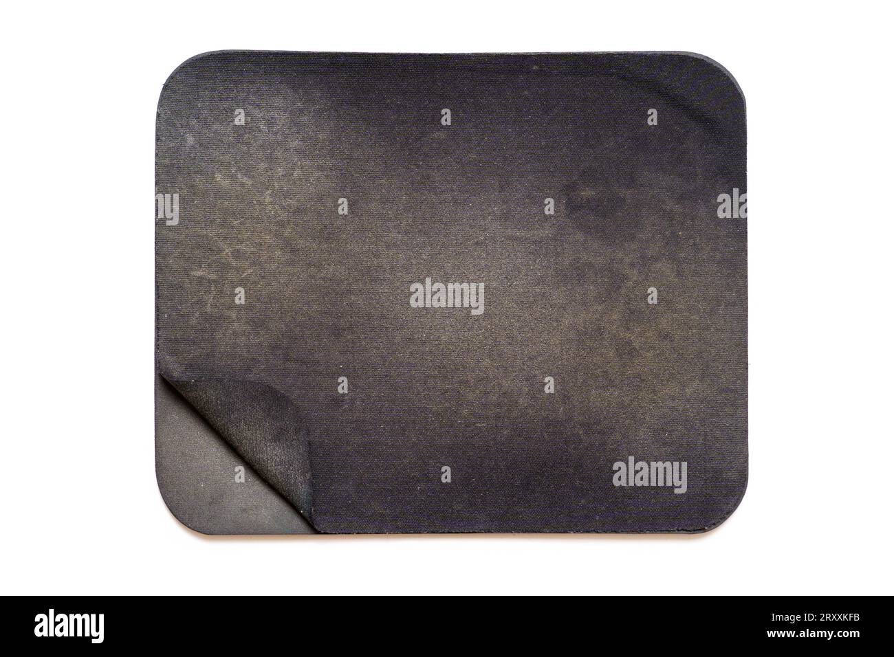 Top view of an old and heavily used mouse pad isolated on white ...