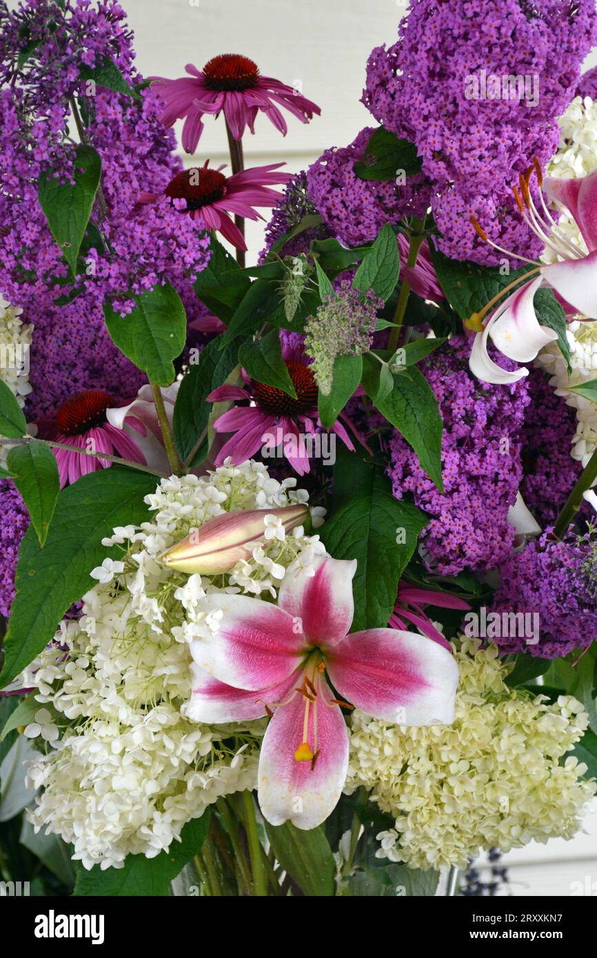 Beautiful lilac and lily floral arrangement Stock Photo - Alamy