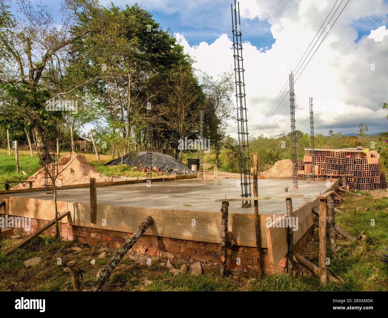 View of a freshly poured concrete slab for a small construction in a ...