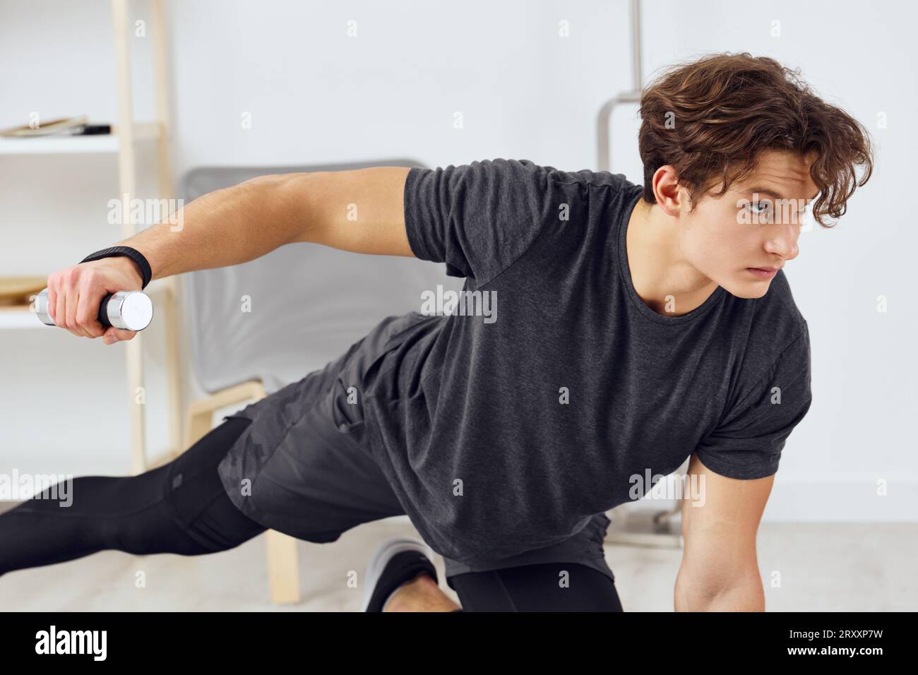 activity man lifestyle home dumbbells health training indoor gray sport ...