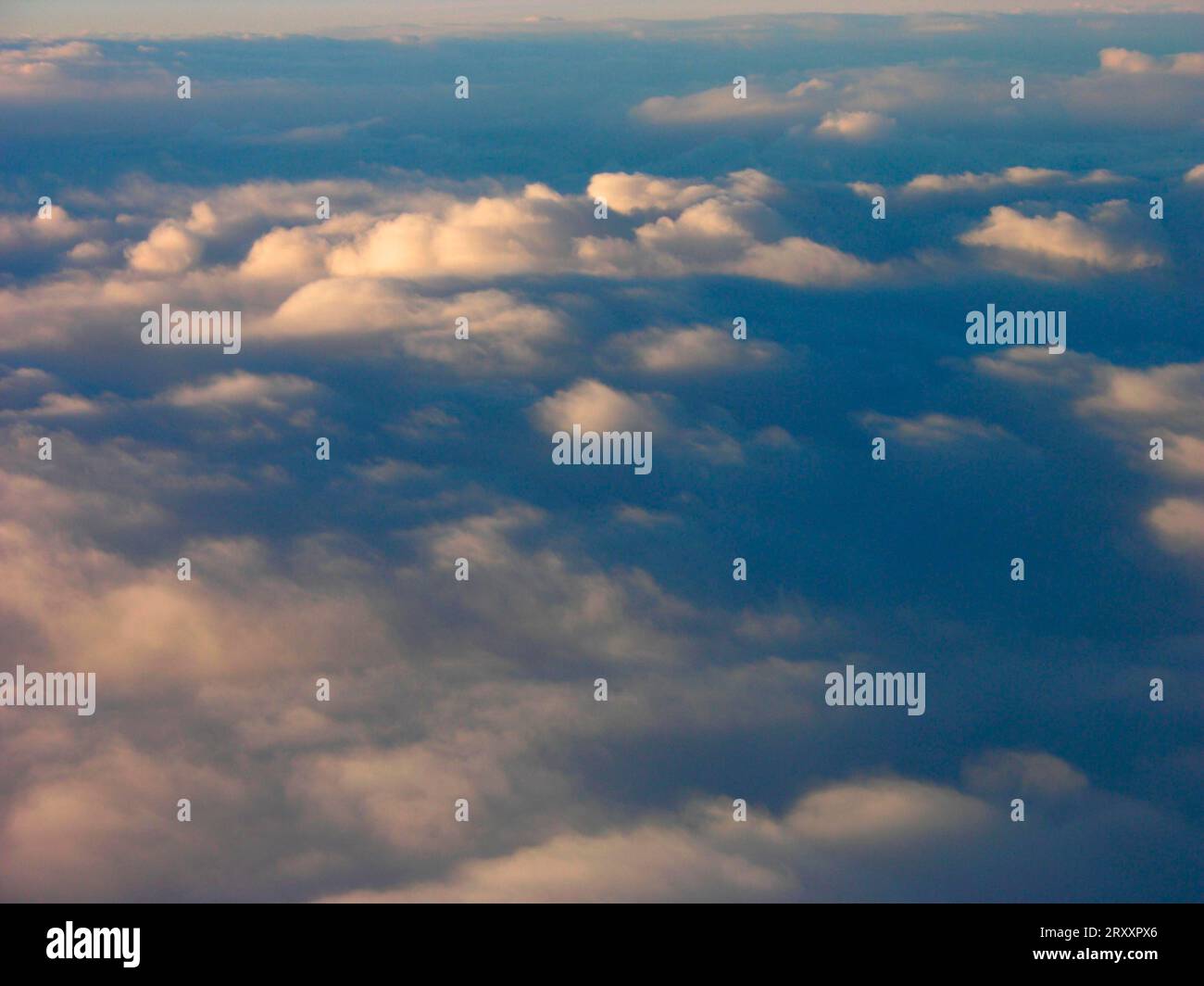 Above the clouds, view from plane Stock Photo - Alamy