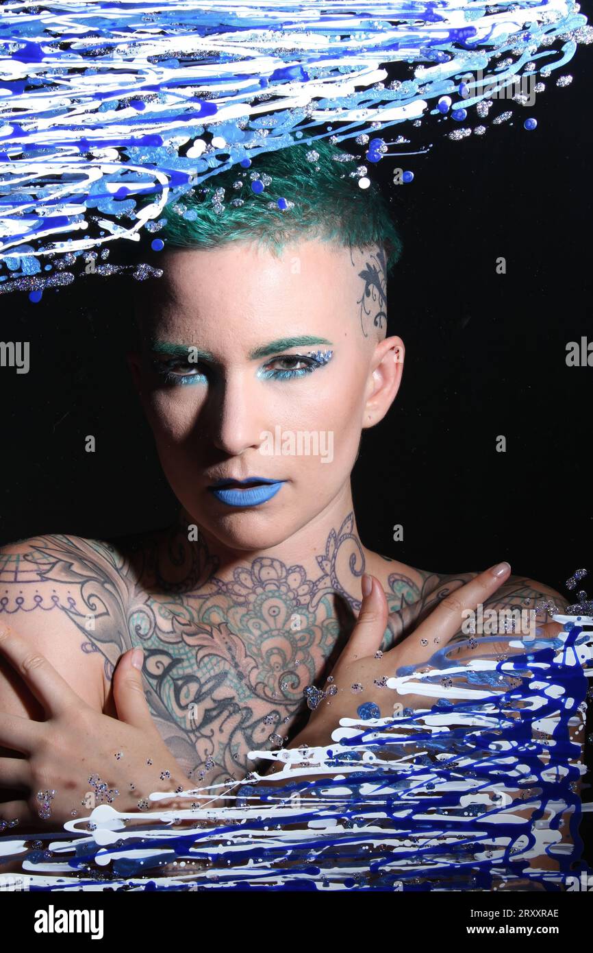 Photoshoot of a model behind glass Stock Photo - Alamy