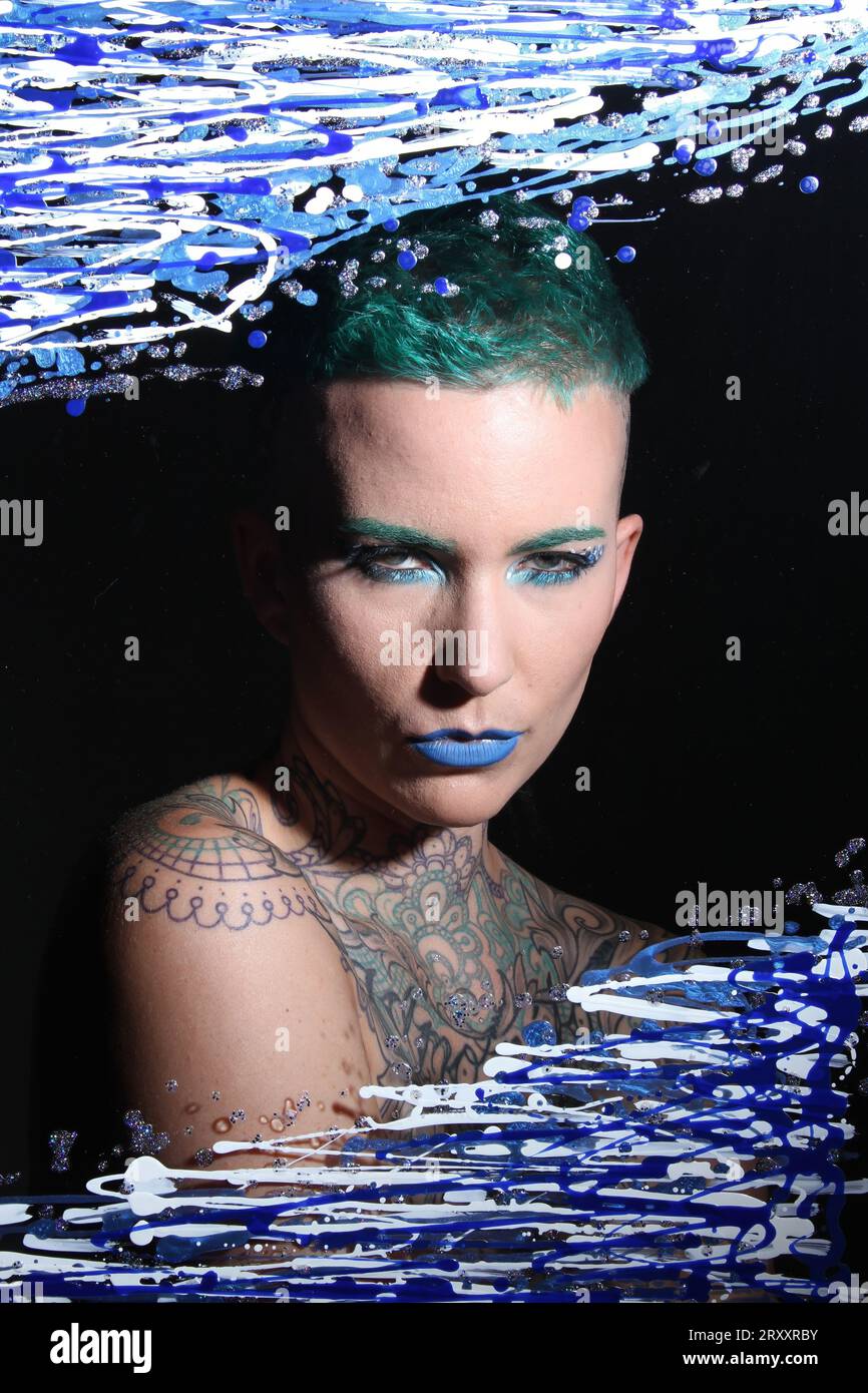 Photoshoot of a model behind glass Stock Photo - Alamy