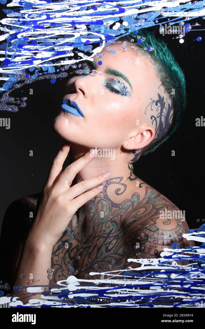 Photoshoot of a model behind glass Stock Photo - Alamy