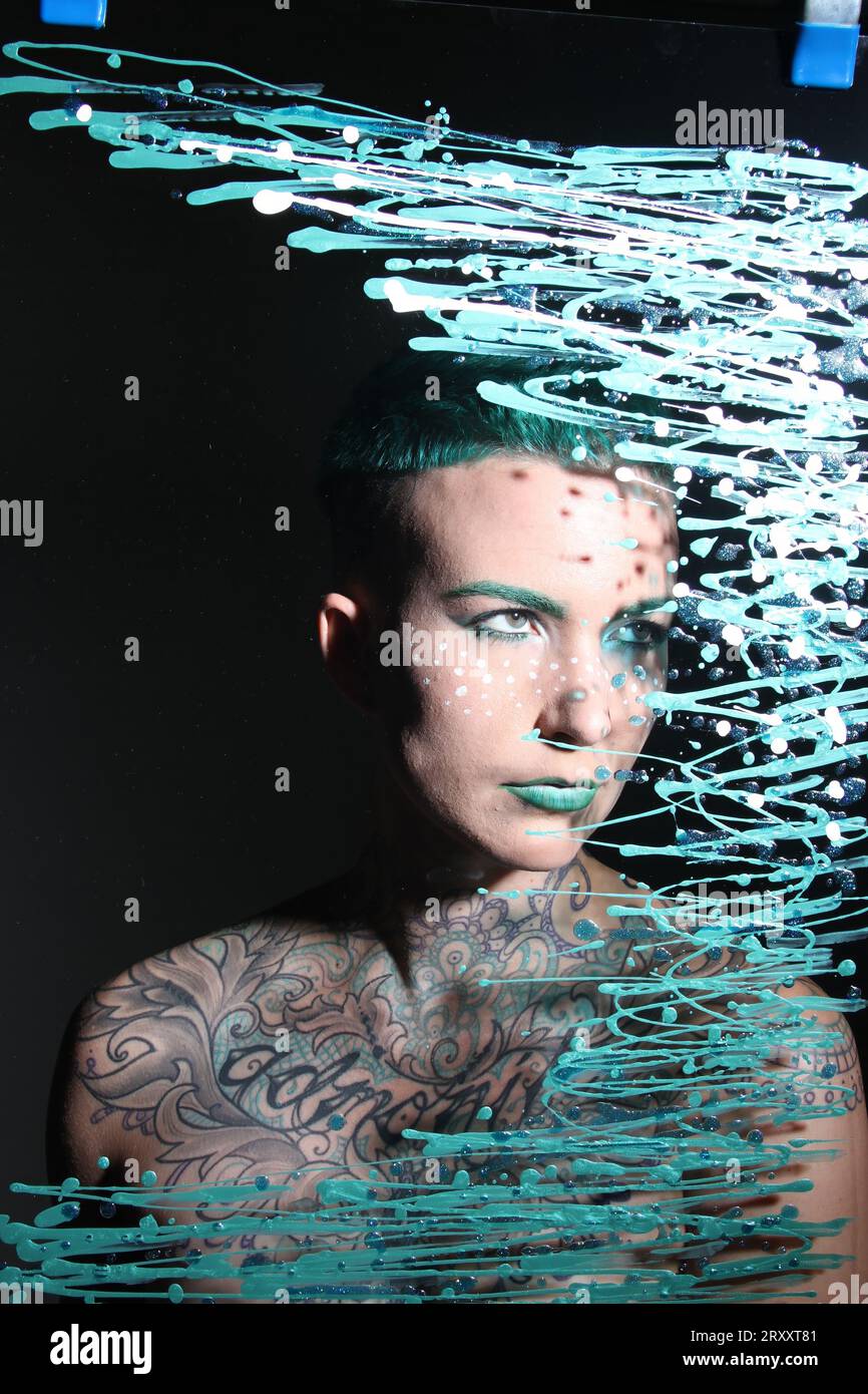 Photoshoot of a model behind glass Stock Photo - Alamy