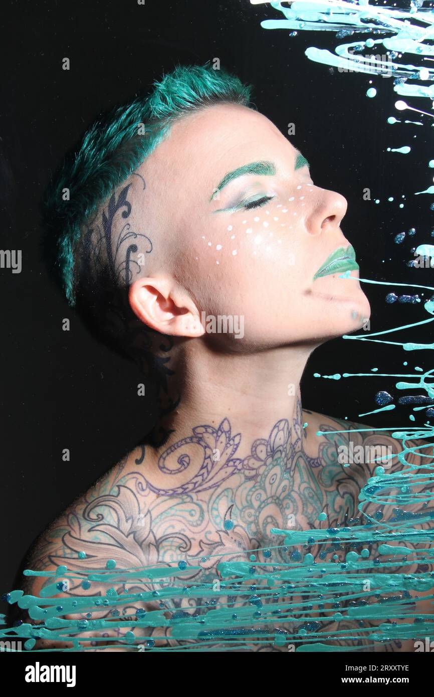 Photoshoot of a model behind glass Stock Photo - Alamy