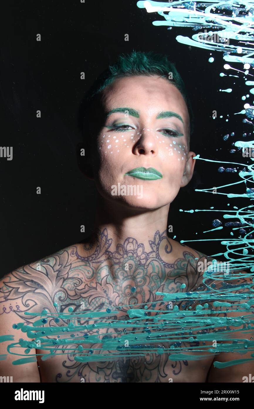 Photoshoot of a model behind glass Stock Photo - Alamy