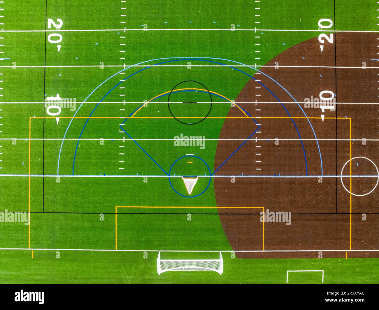 New synthetic turf field with football and baseball with lines and ...