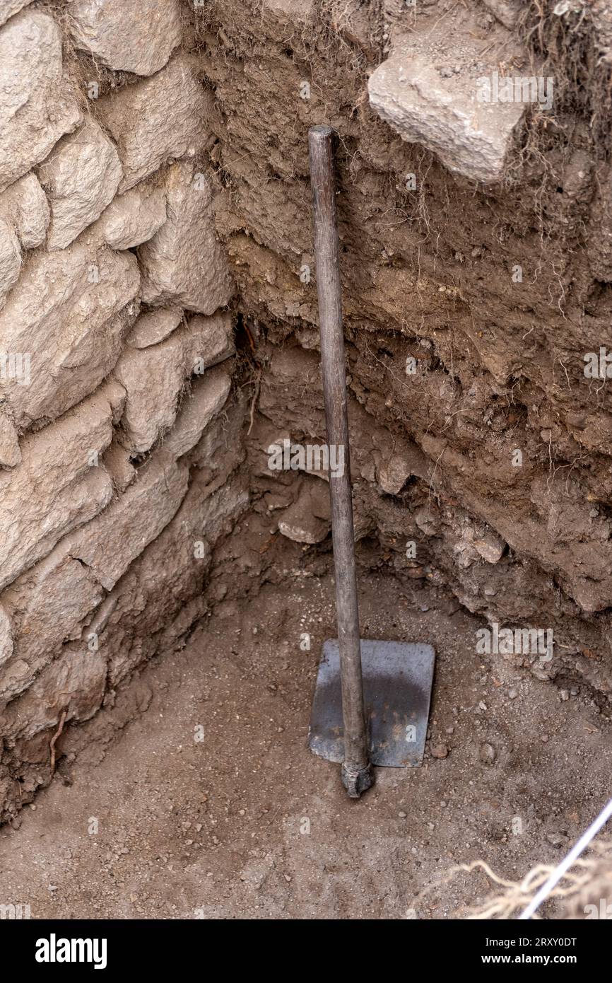 A hoe in an archaeological excavation Stock Photo - Alamy