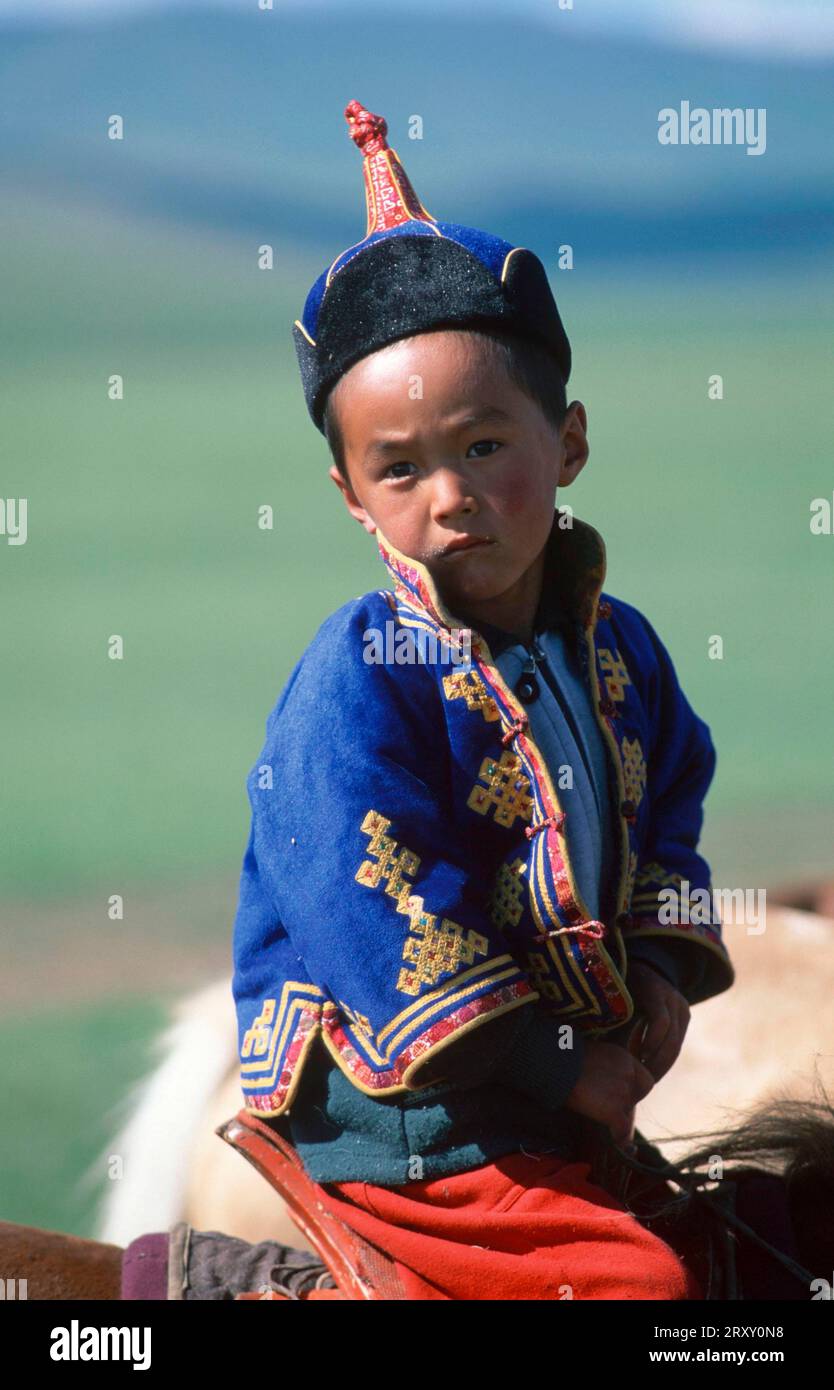 Mongolian boy on horseback, suburb of Ulaan Baatar, Mongolia Stock Photo - Alamy