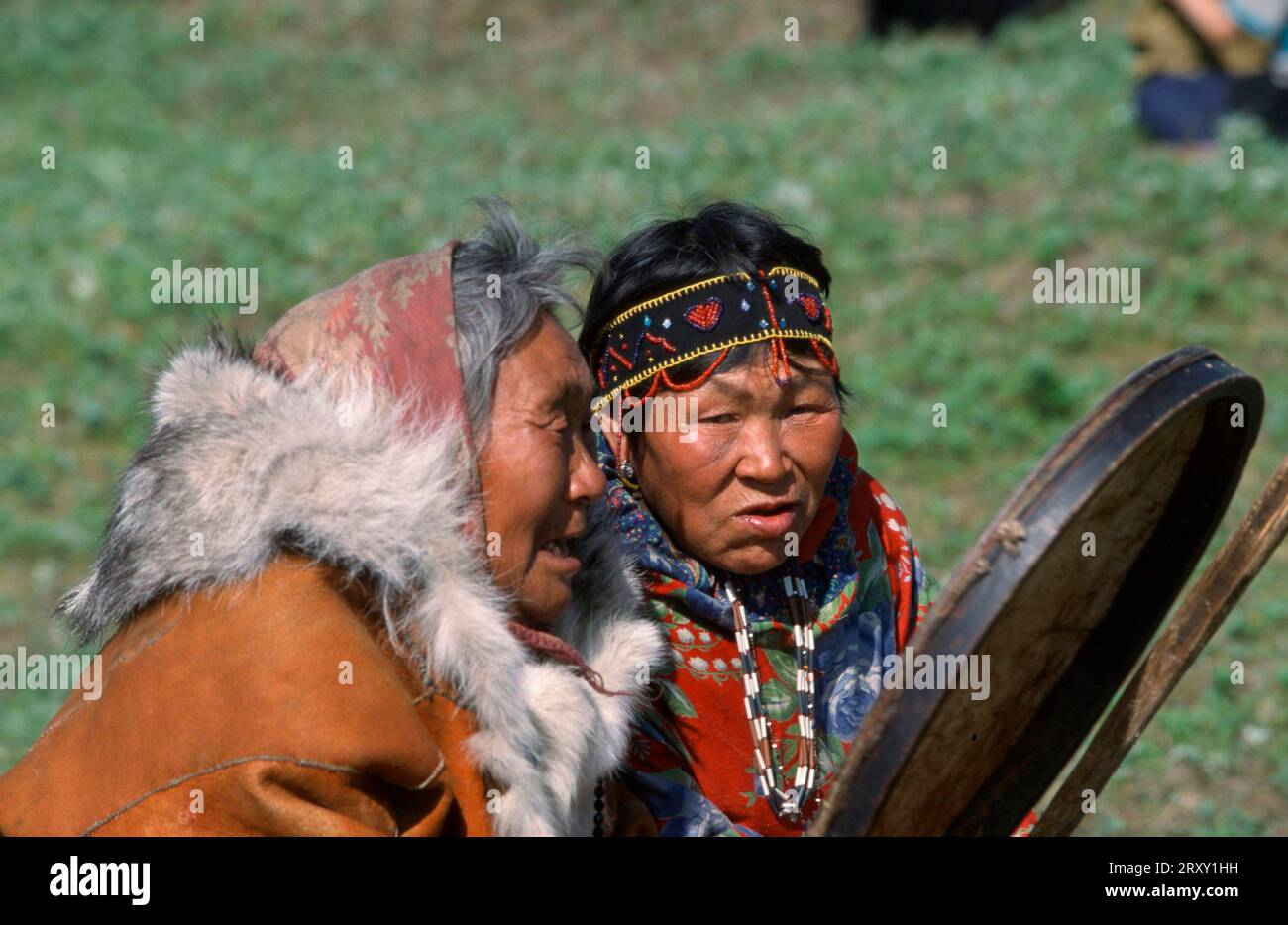 Drumming Chukchi Eskimo woman, Yanrakino village, Chukotka province ...