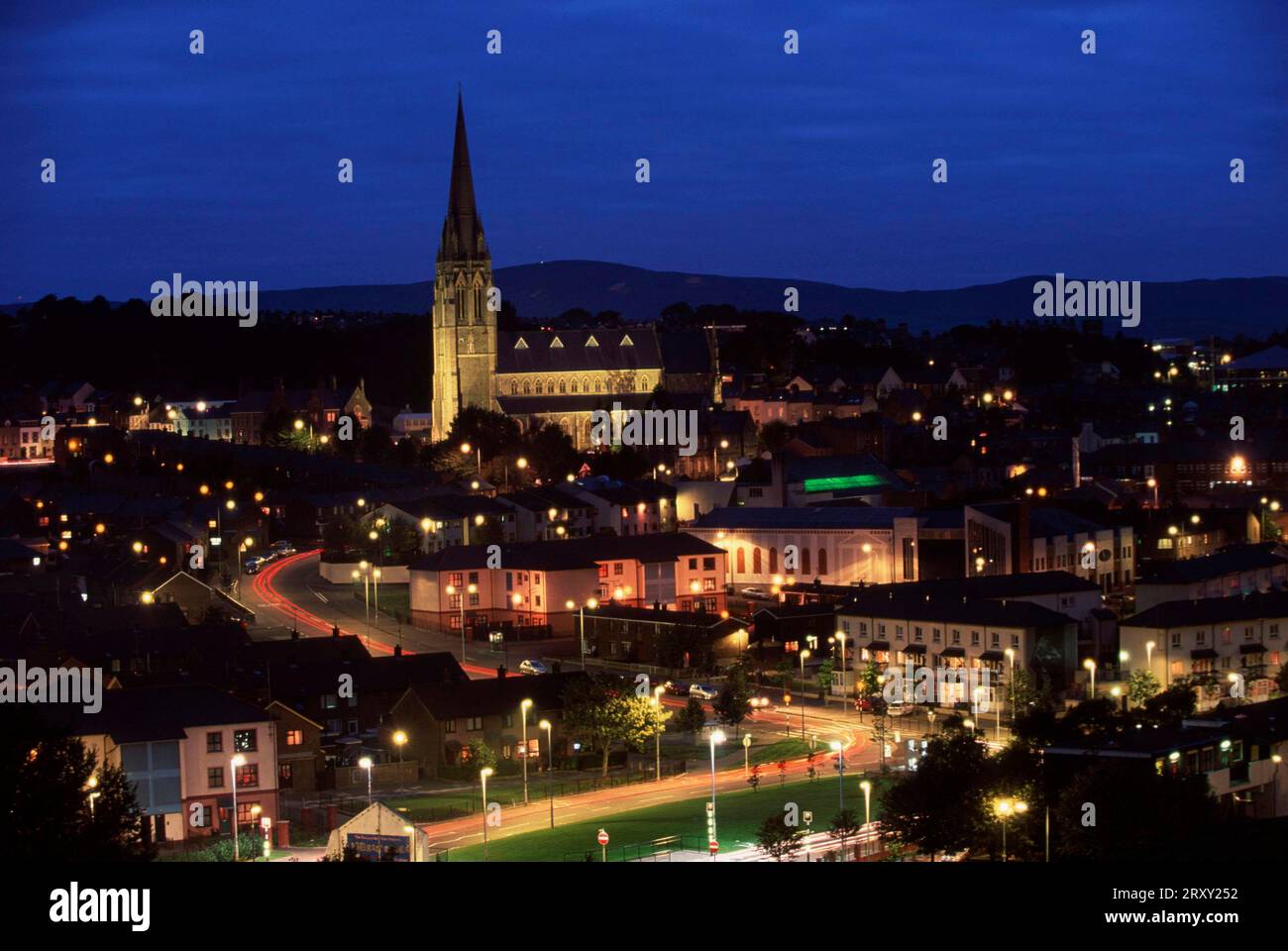 View on Derry, former Londonderry, from city wall at night, County ...