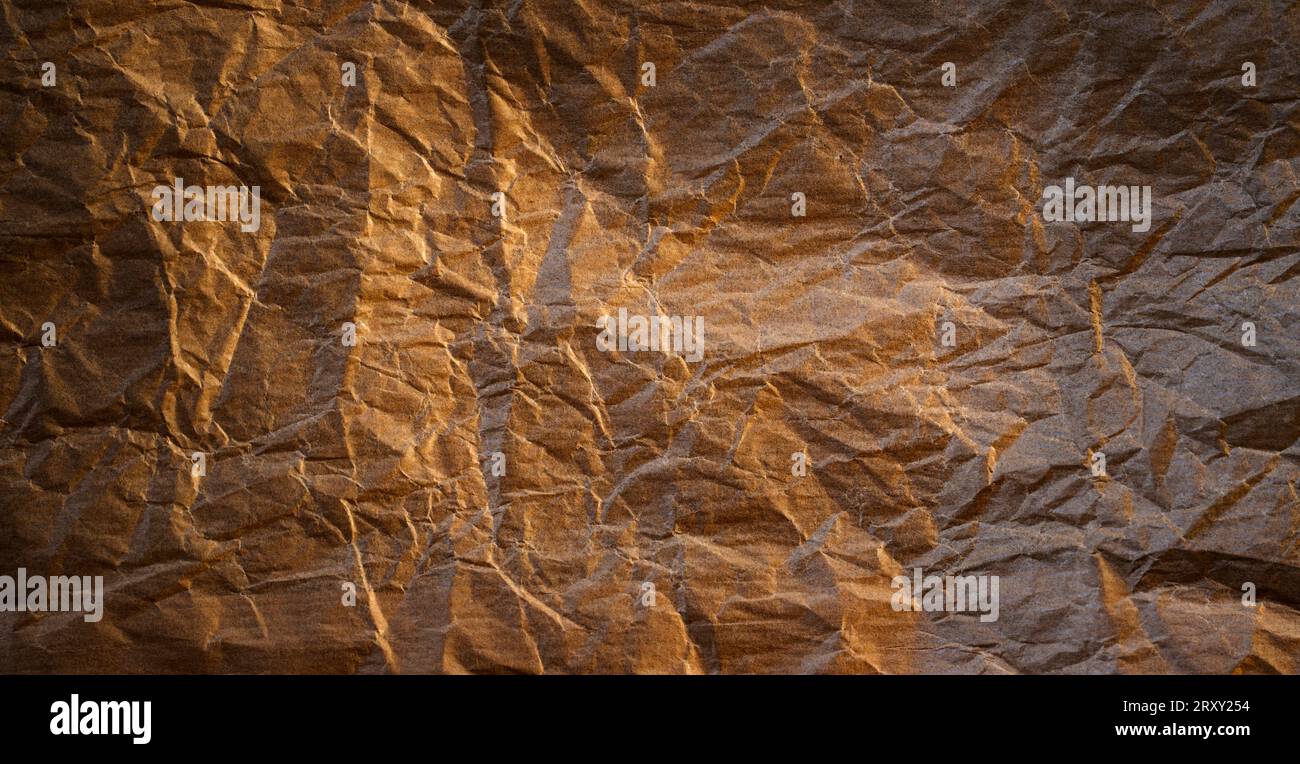 Brown crinkled wrapping paper with a lot of texture. Concept ...