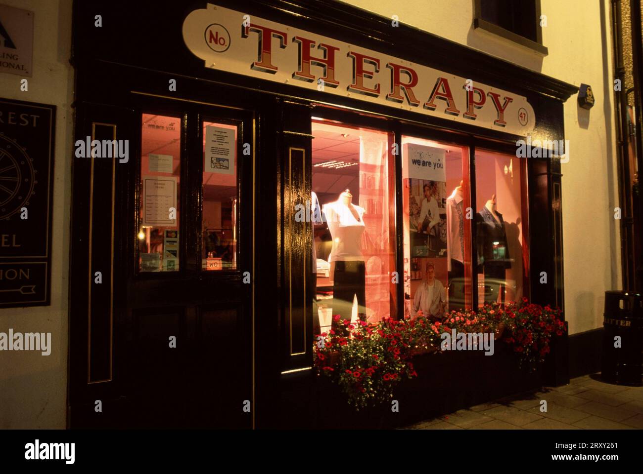 Shop window of shop 'Therapy' at night, Bushmills, County Antrim ...