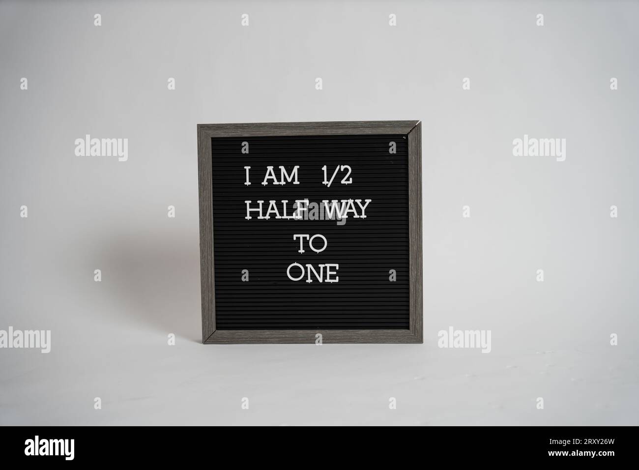 I'm halfway to one years old. half way to one black board on a white ...