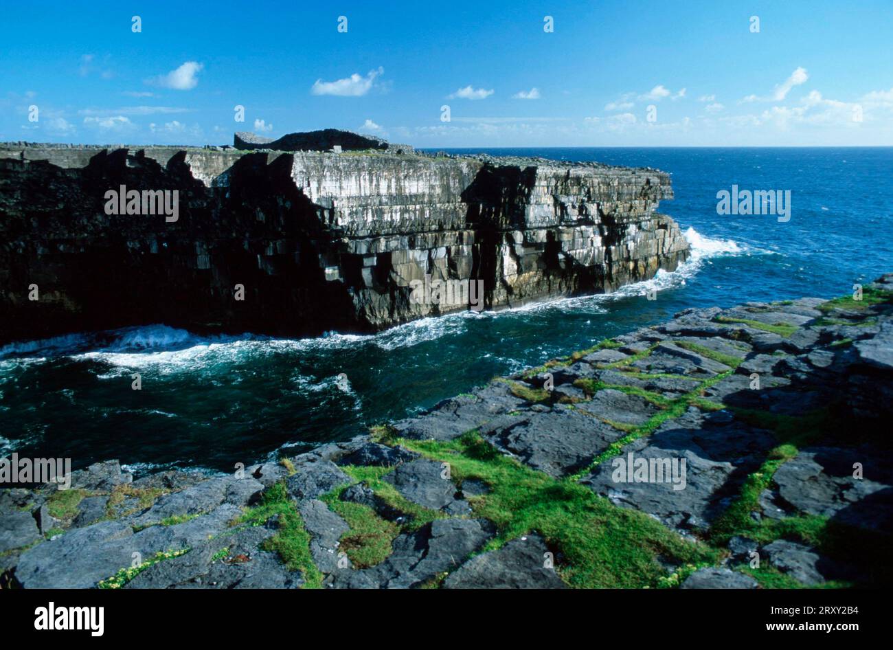 Steep coast and Fort Dun Ducathair, The Black Fort, Island Inishmore ...