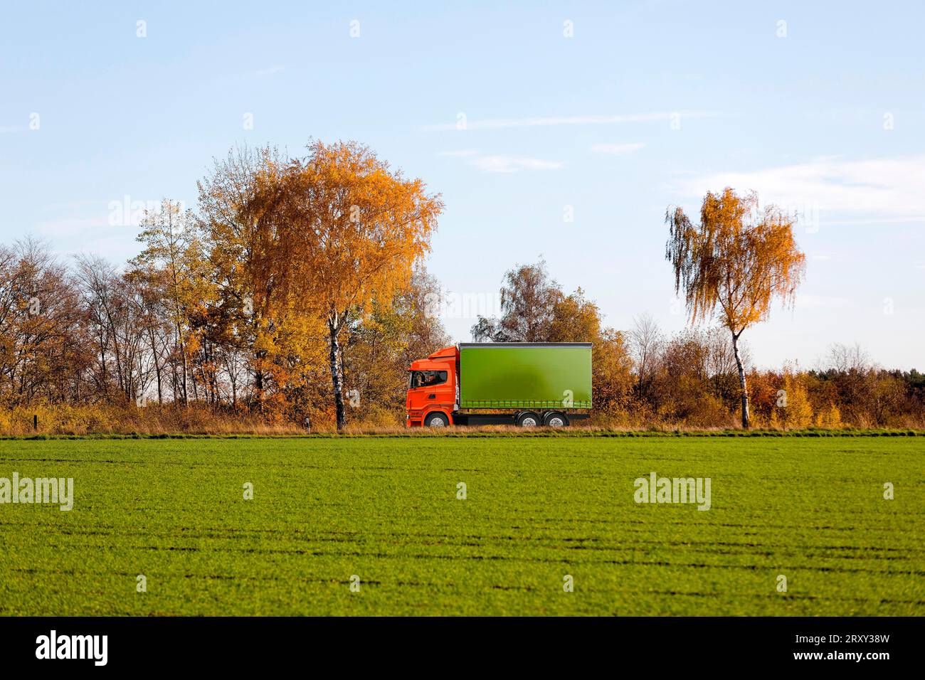 Truck transporting goods over land, Lower Saxony, Germany Stock Photo ...