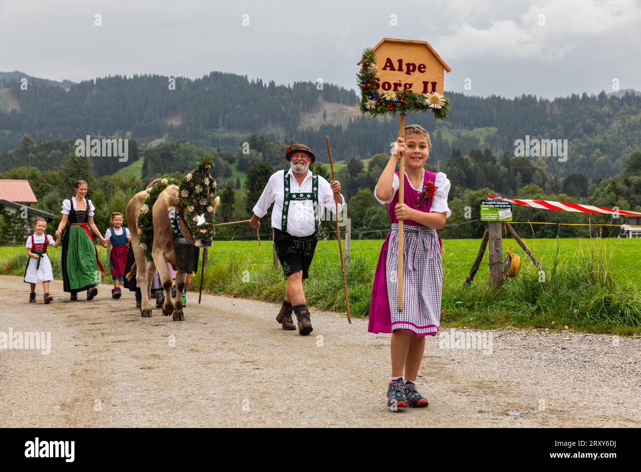 Alpine pasture child with alpine pasture board, girl, alpine pasture ...