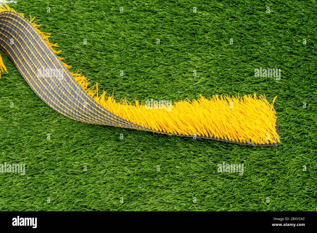 Synthetic turf field under construction with lines and graphics being ...