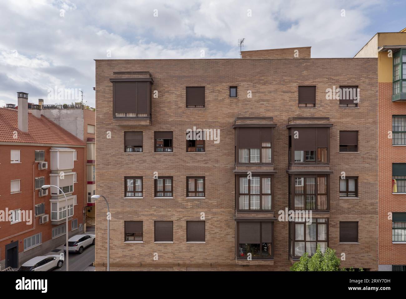 Facade of a residential residential building built with light brown ...