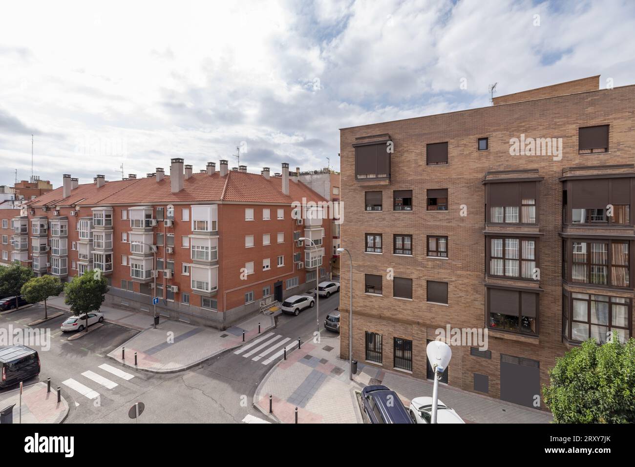 Facades of a residential building at a street intersection with painted ...