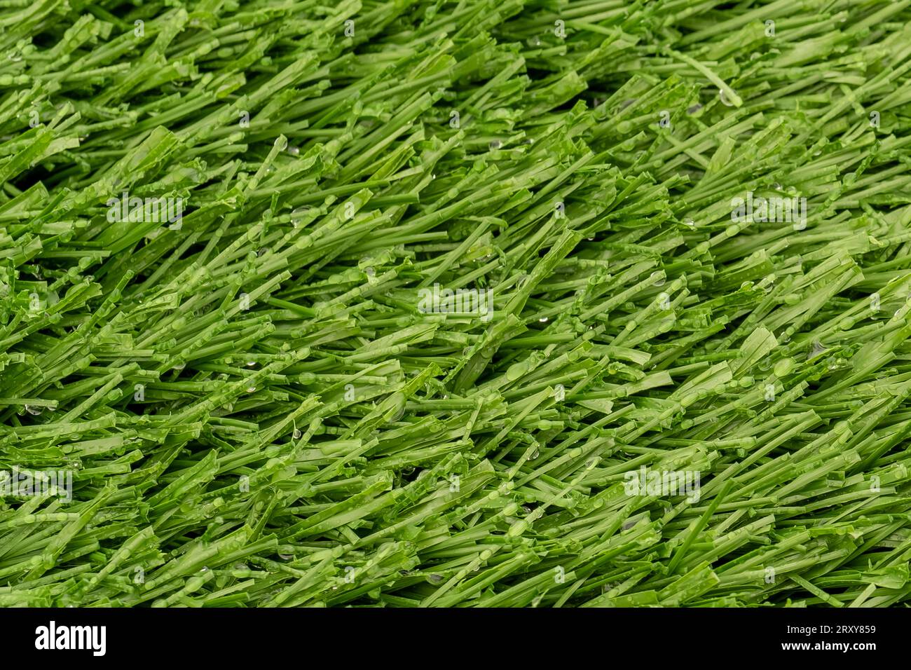 Synthetic turf field under construction with lines and graphics being ...