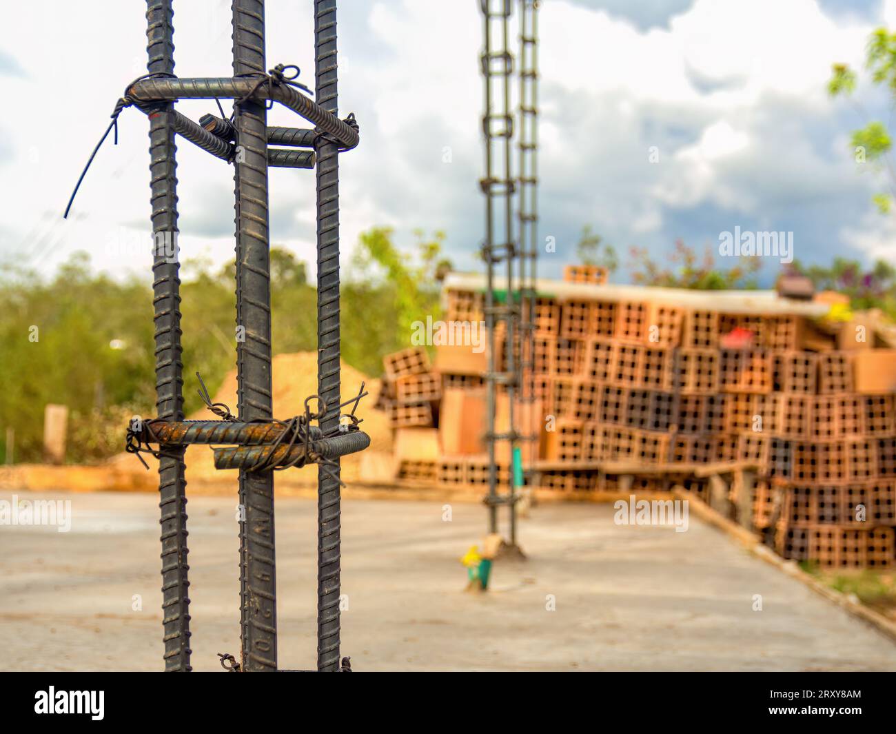 View of the structural iron rods for the concrete columns of a rural ...