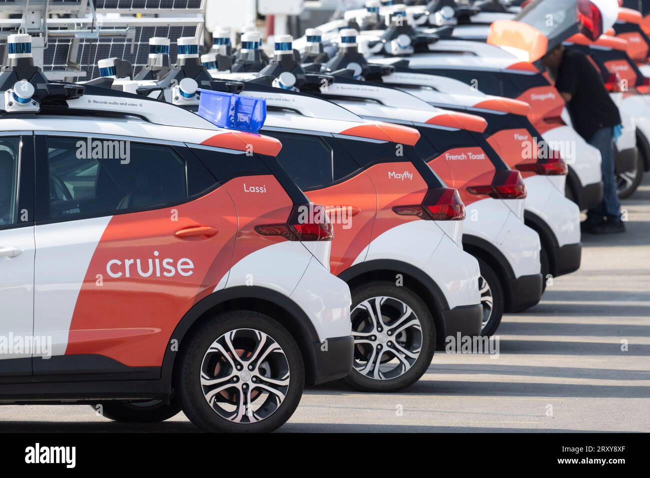 A large fleet of Cruise autonomous vehicles (AV's) goes through ...