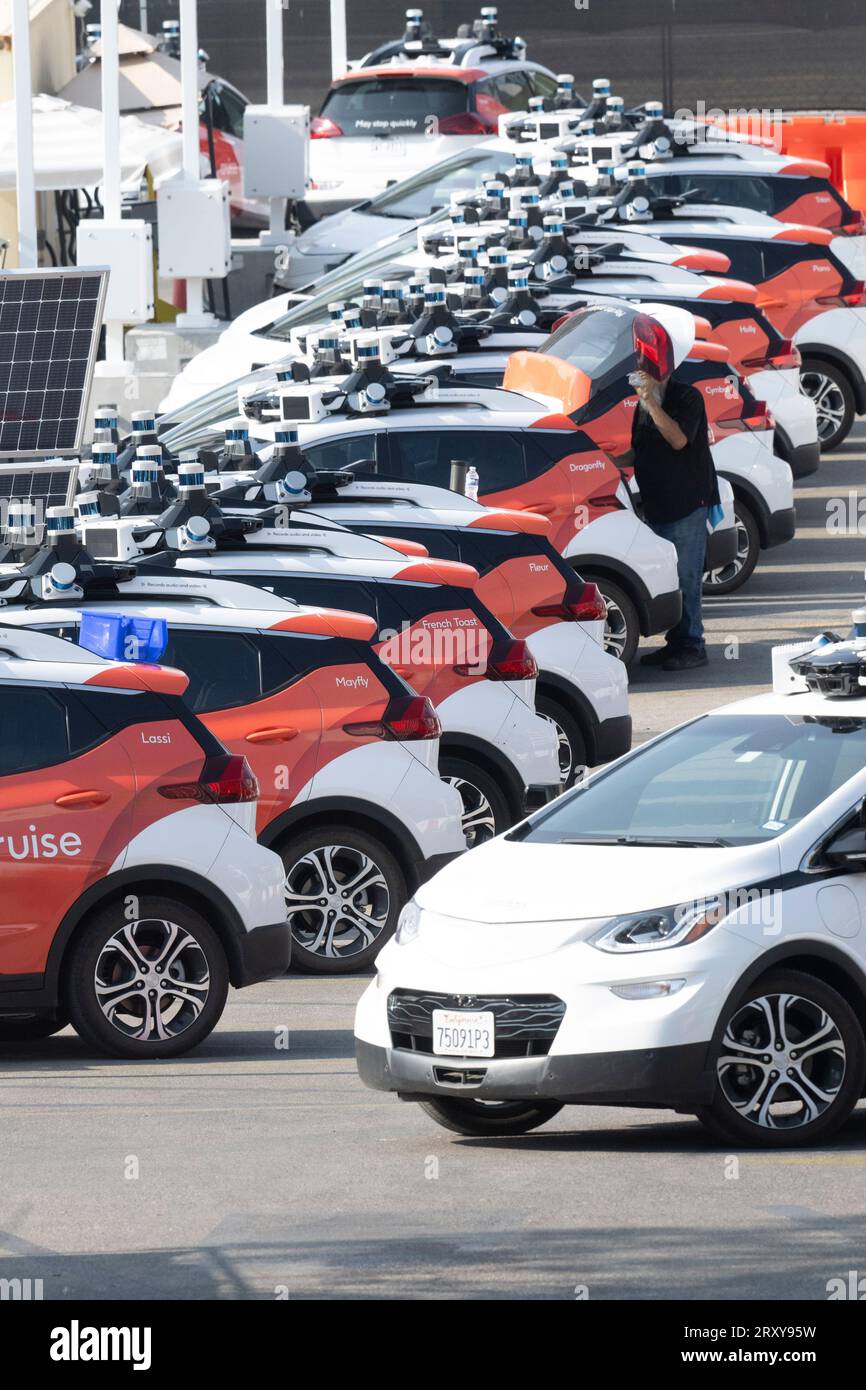 A large fleet of Cruise autonomous vehicles (AV's) goes through ...