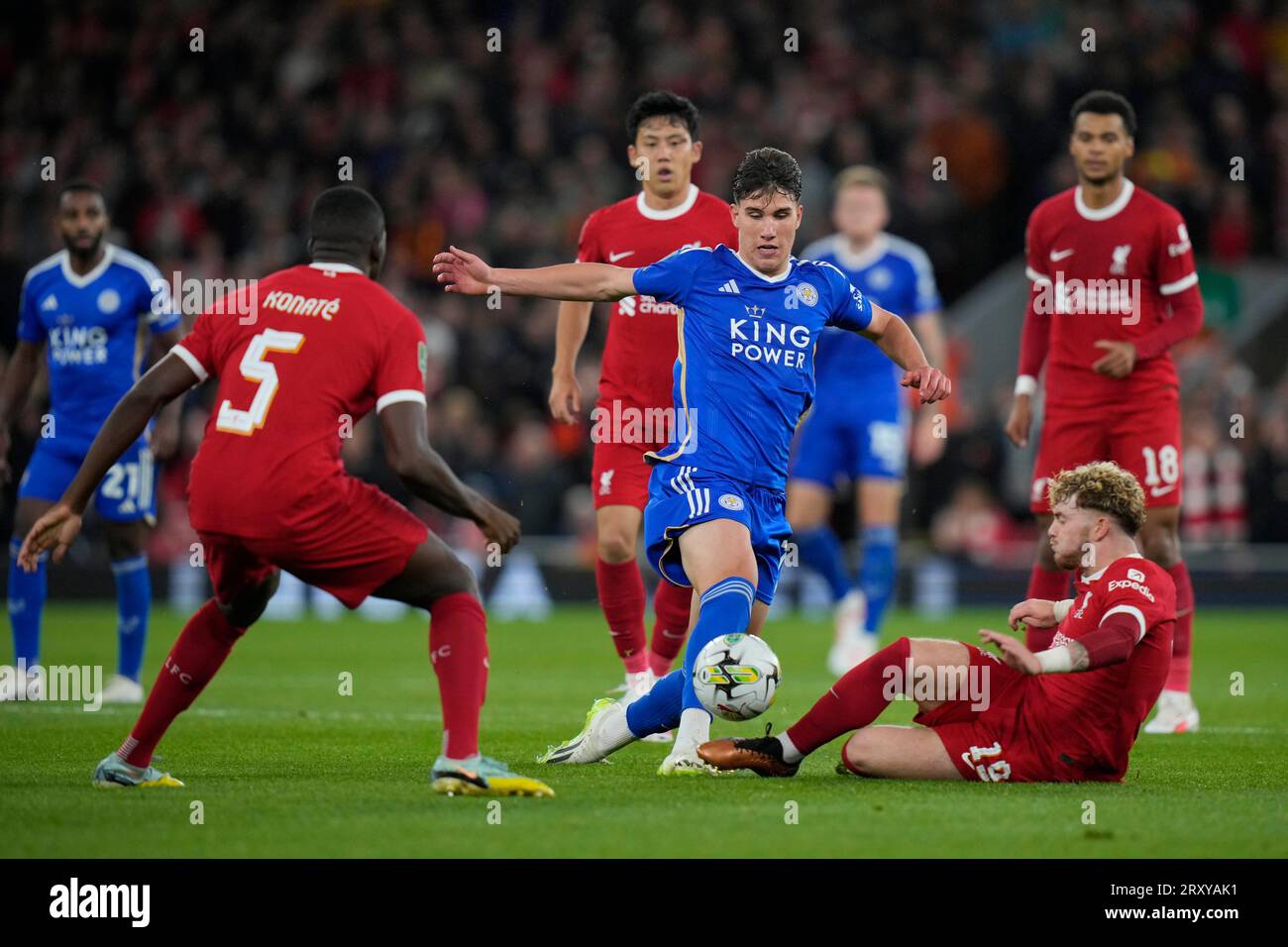 Harvey Elliott #19 of Liverpool slides into a tackle on Cesare Casadei ...