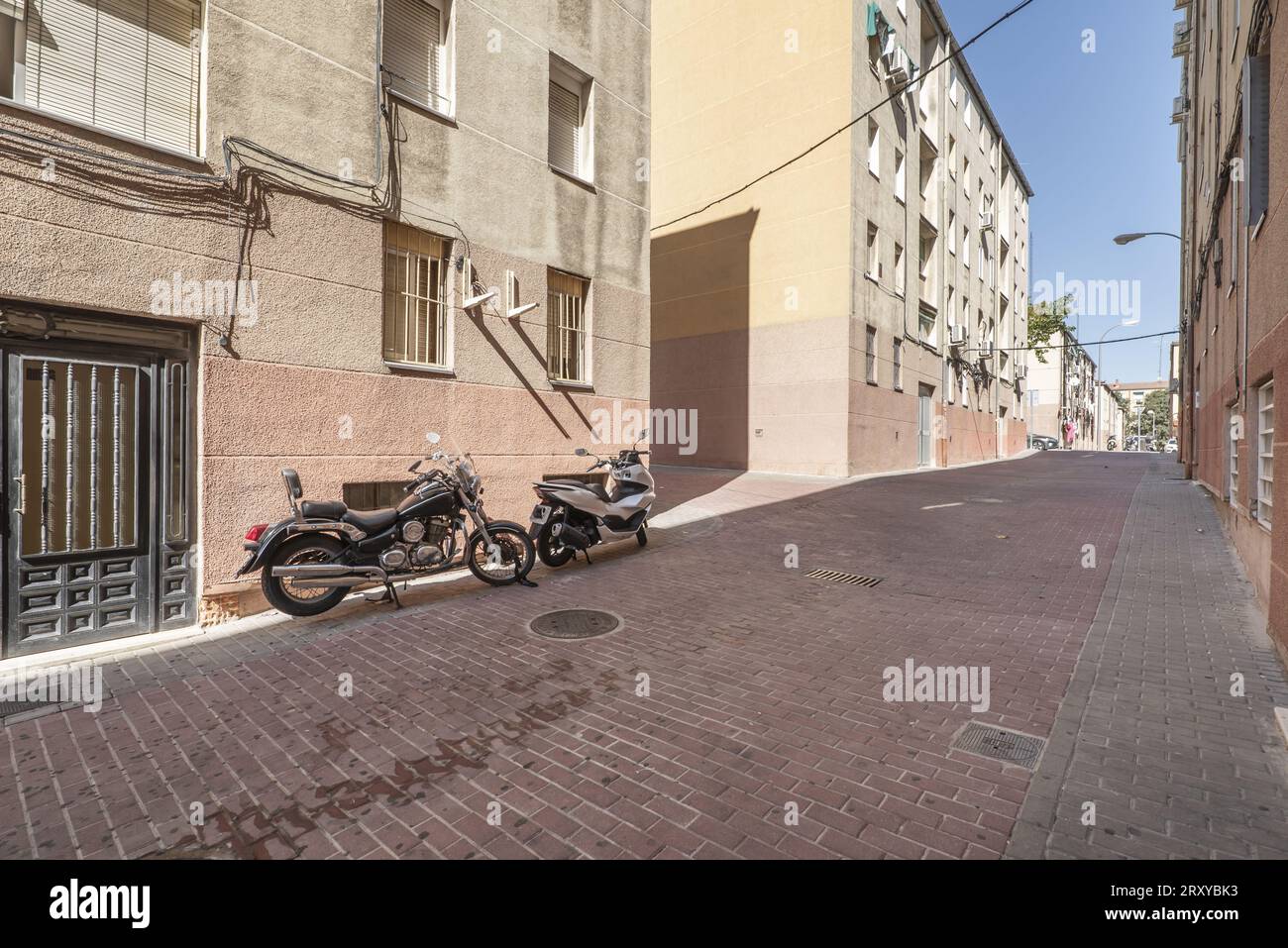Apartment building motorcycles parked hi-res stock photography and ...