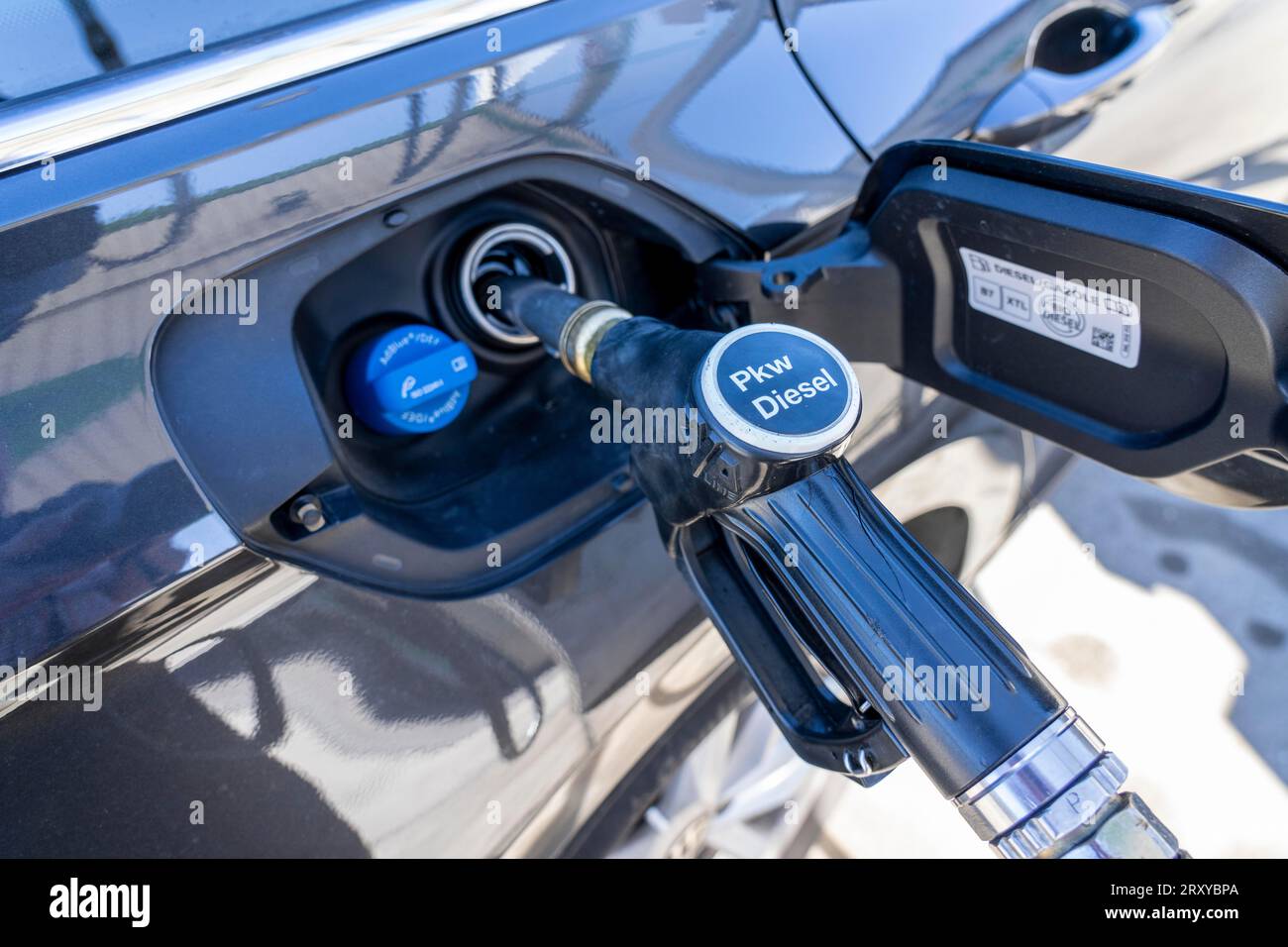 Diesel car is refuelled with diesel fuel, petrol station Stock Photo ...