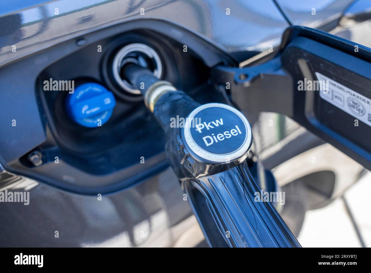 Diesel car is refuelled with diesel fuel, petrol station Stock Photo ...