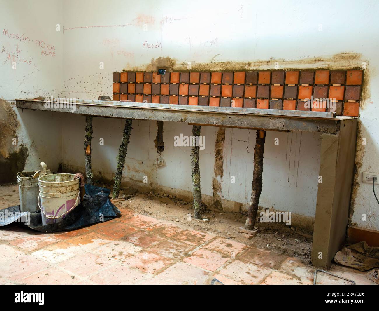 View of the quite improvised and obsolete construction of a kitchen ...