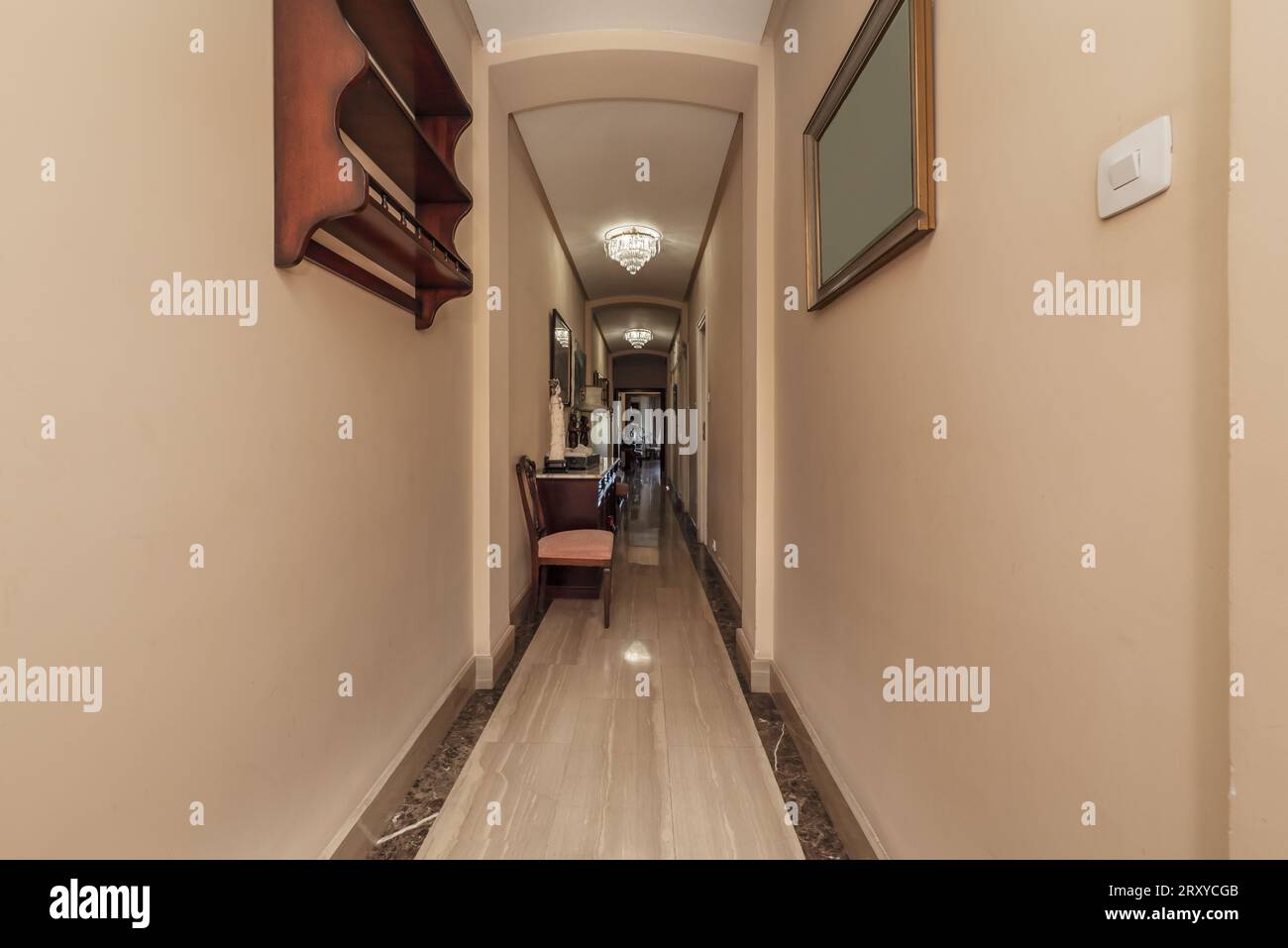 A hallway with marble floors, access to other rooms Stock Photo - Alamy