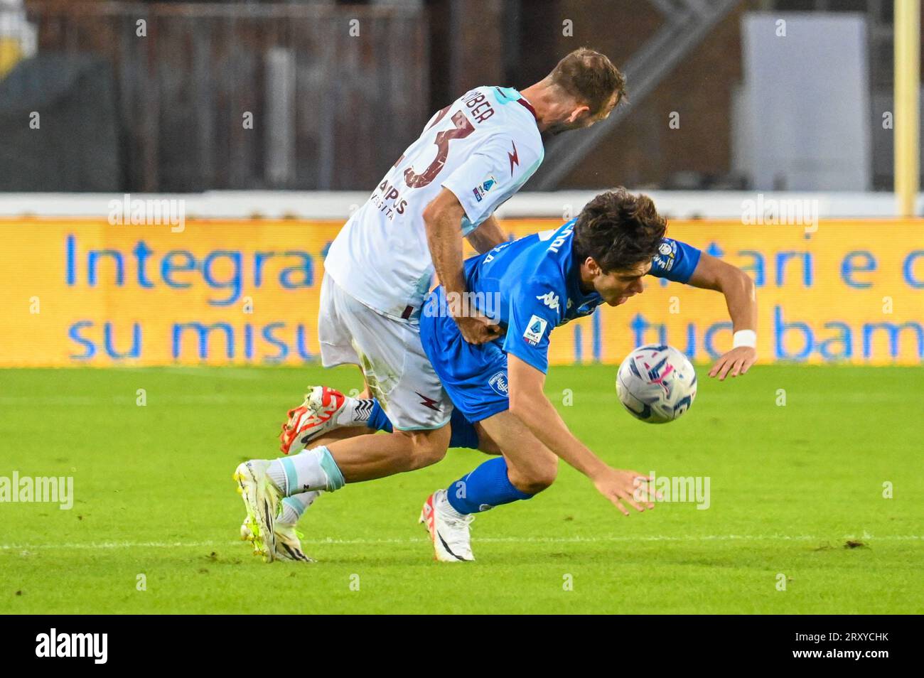Empoli's Stiven Shpendi is fouled by Salernitana's Norbert Gyomber ...