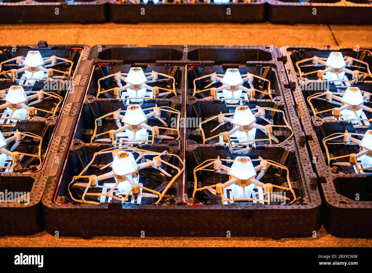 Drones sit dormant in their cases in preparation for the launch. 800 ...