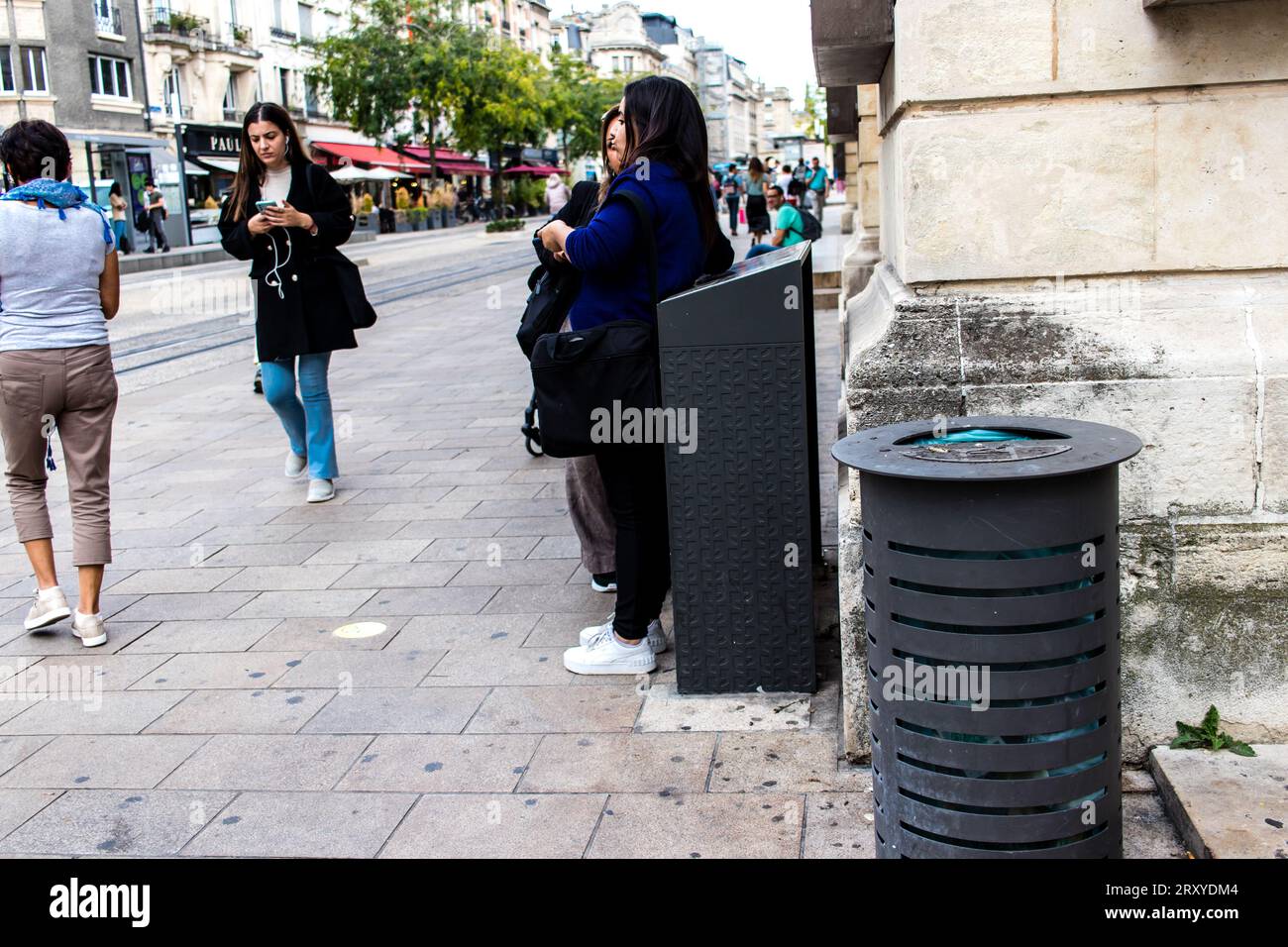 Reims, France - September 26, 2023 People wandering in the street of ...