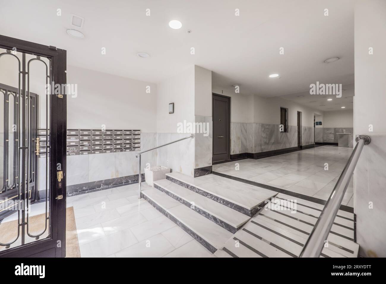 Access portal to the building with white marble floors Stock Photo - Alamy