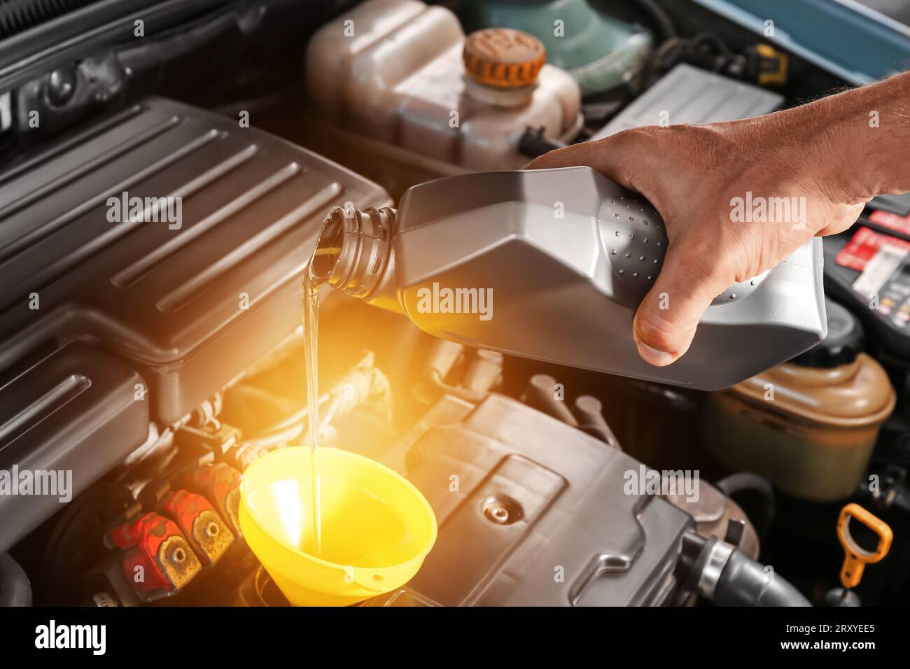 Man pouring motor oil from hi-res stock photography and images - Alamy