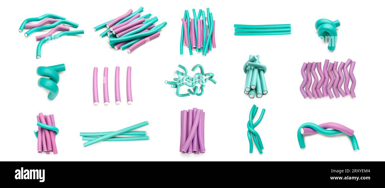 Set of different hair curlers on white background Stock Photo - Alamy