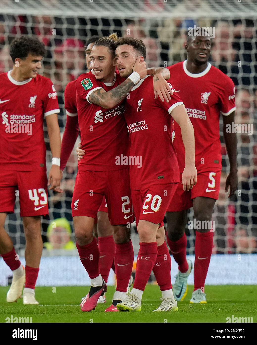 Kostas Tsimikas #21 of Liverpool celebrates with goal scorer Diogo Jota ...
