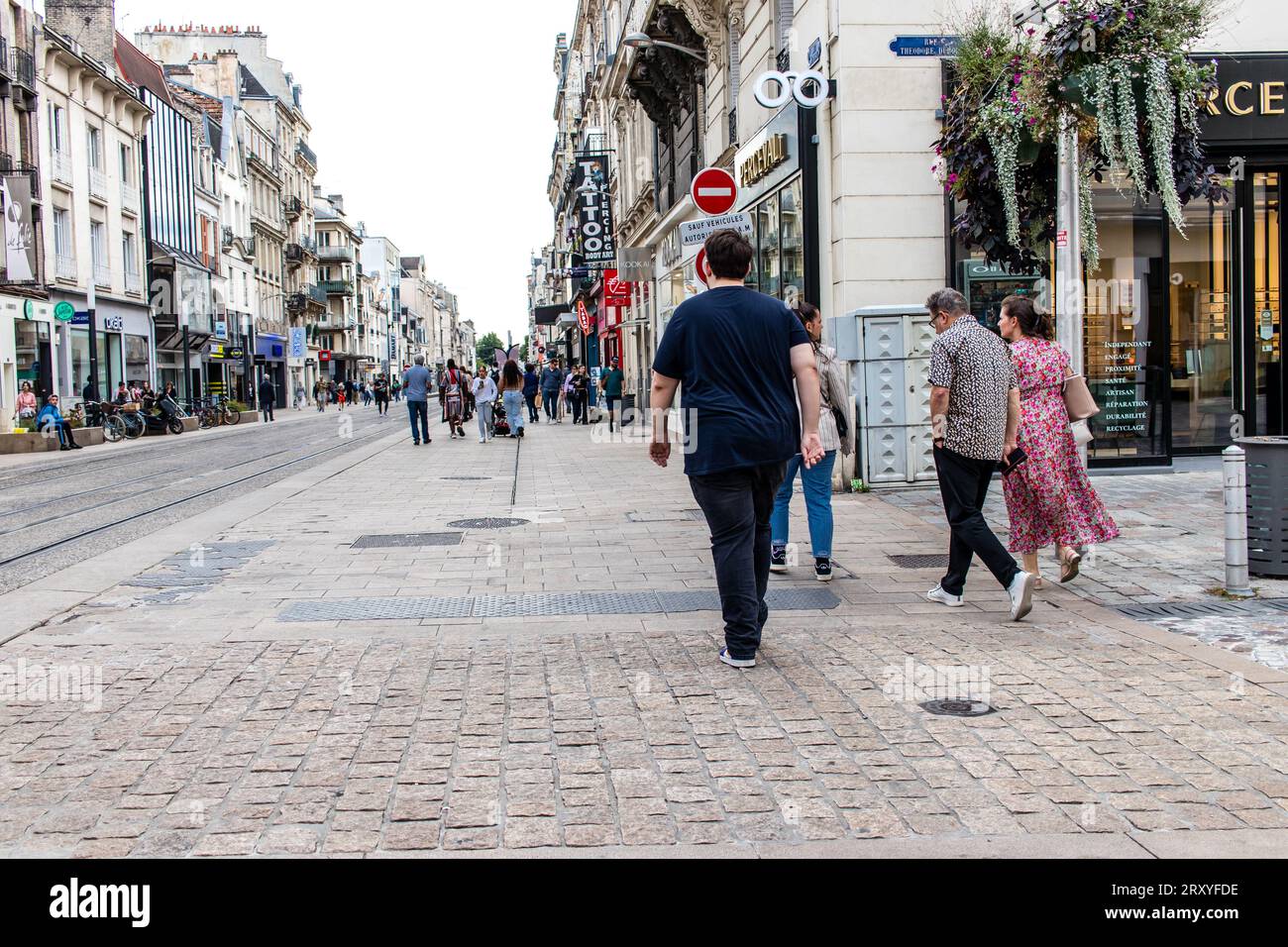Reims, France - September 26, 2023 People wandering in the street of ...