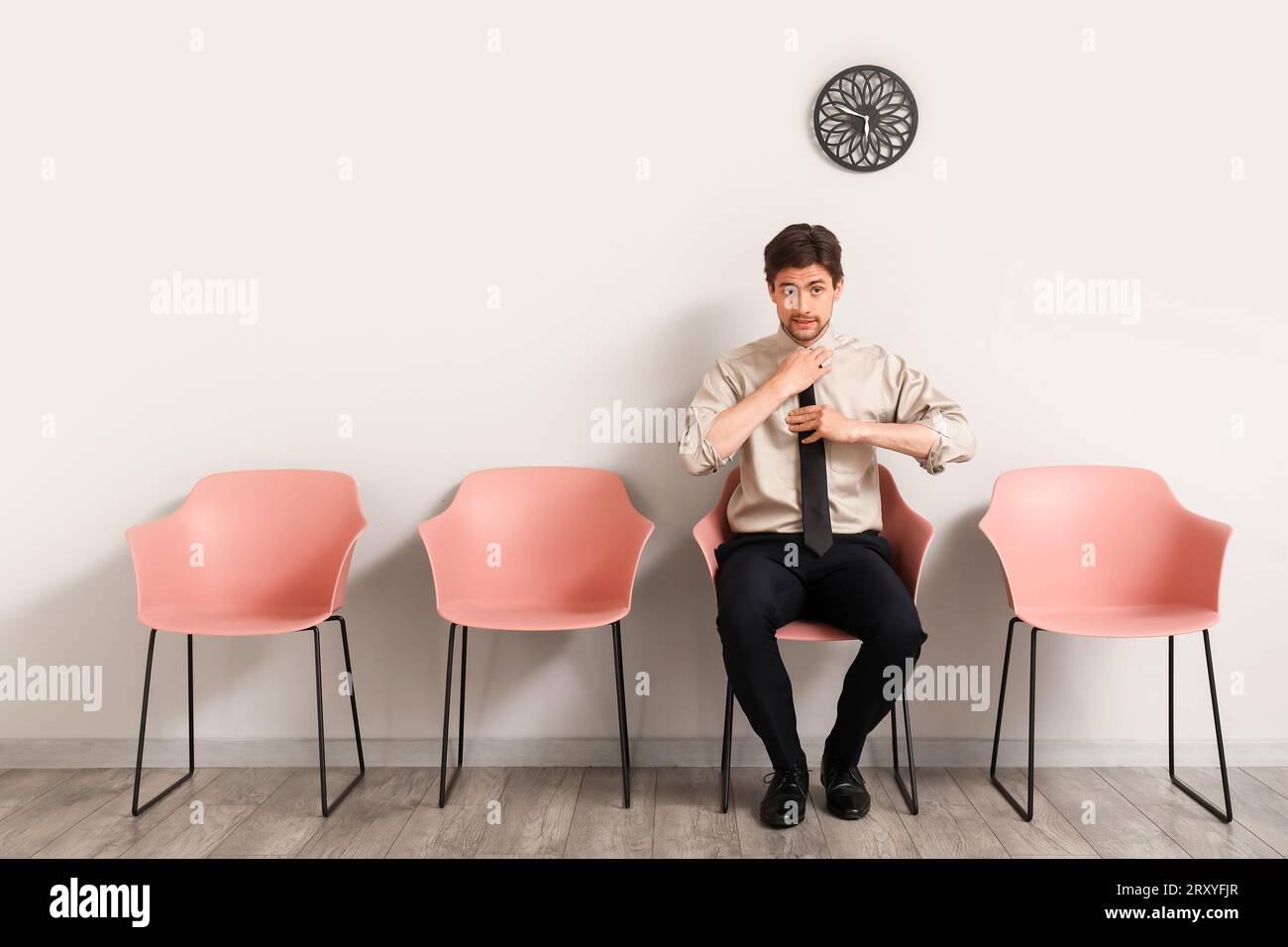 Male applicant waiting for job interview in room Stock Photo - Alamy